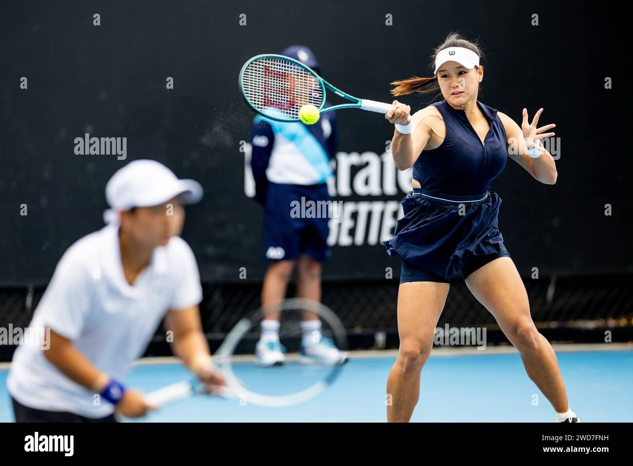 Melbourne, Australia. 19th Jan, 2024. Guo Hanyu (R)/Jiang Xinyu compete ...
