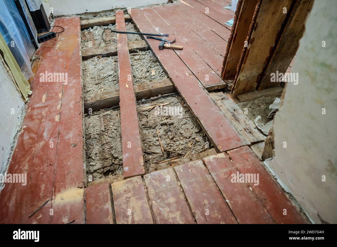 Old wooden floor repairing. Old planks on the floor Stock Photo - Alamy