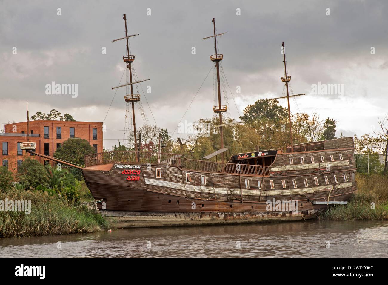 Old ship at channel of Rioni river in Poti. Georgia Stock Photo - Alamy