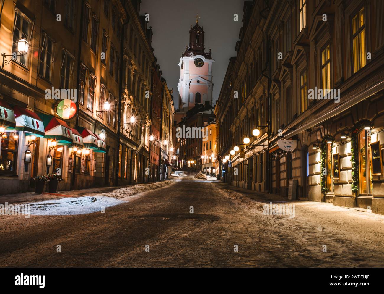 A church tower and snowy street at night, Gamla Stan, Stockholm Stock ...