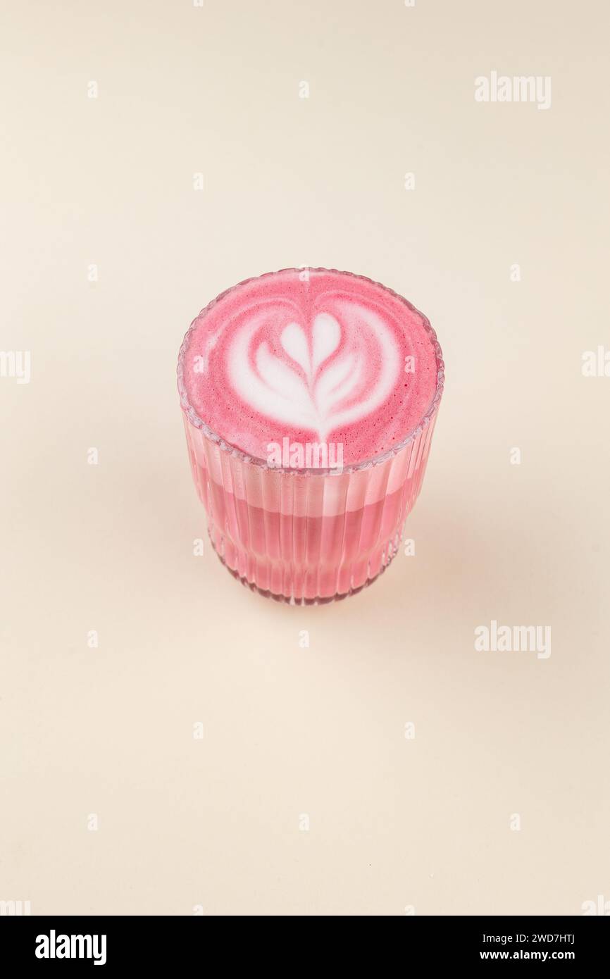 pink matcha latte on a cup on a light background Stock Photo - Alamy