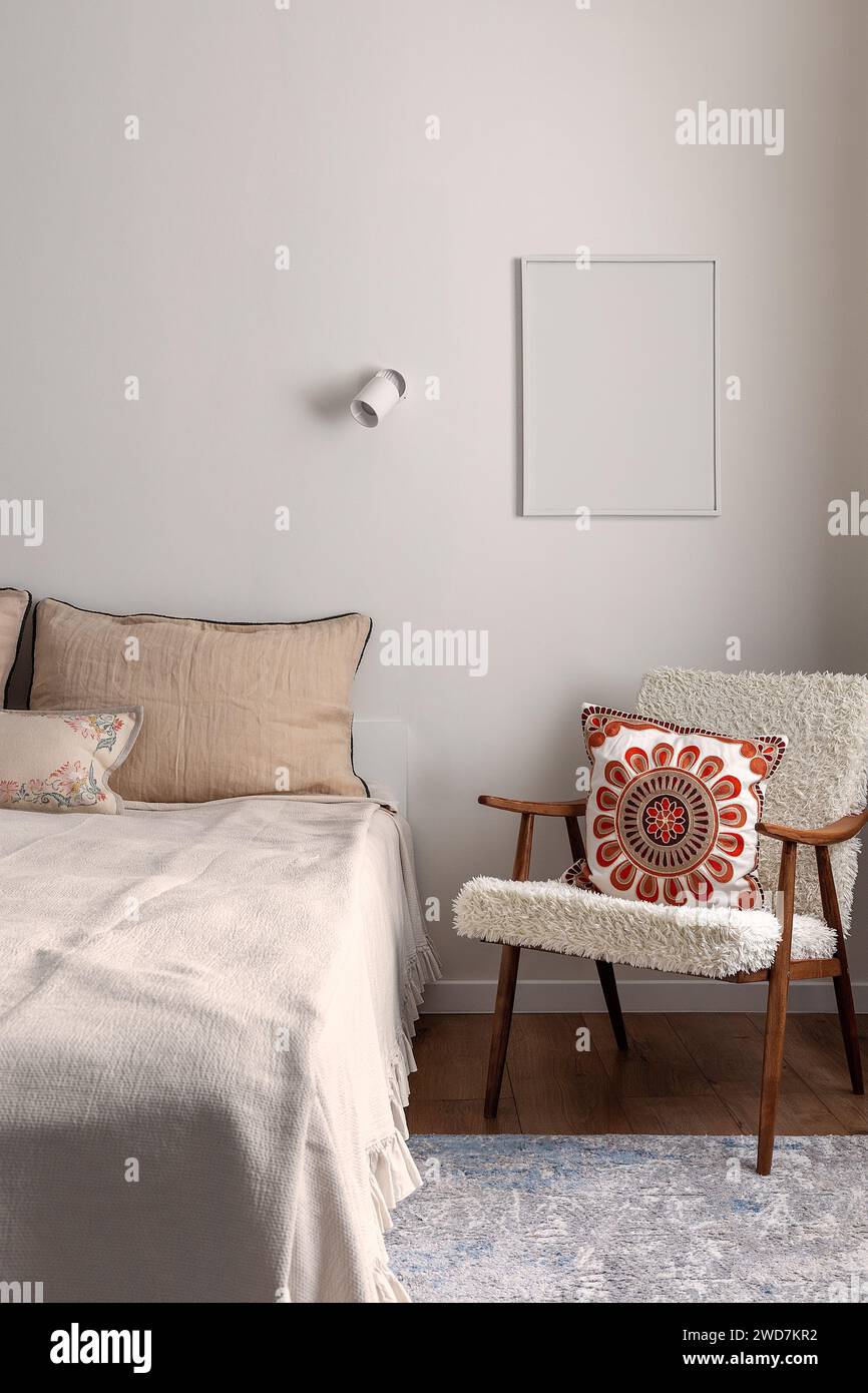 Bedside area with a soft seat and a beautiful cushion Stock Photo - Alamy