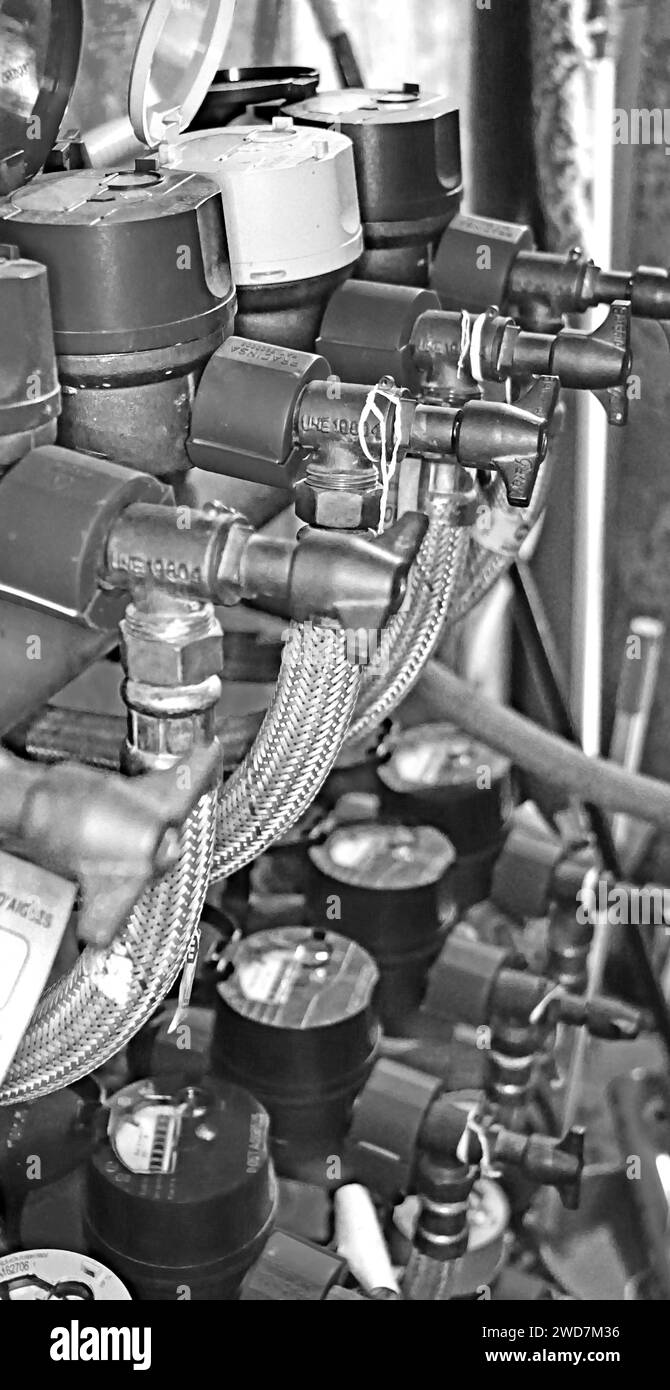 Water meters of a block of flats for backgrounds Stock Photo - Alamy