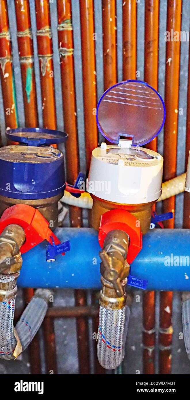 Water meters of a block of flats for backgrounds Stock Photo - Alamy