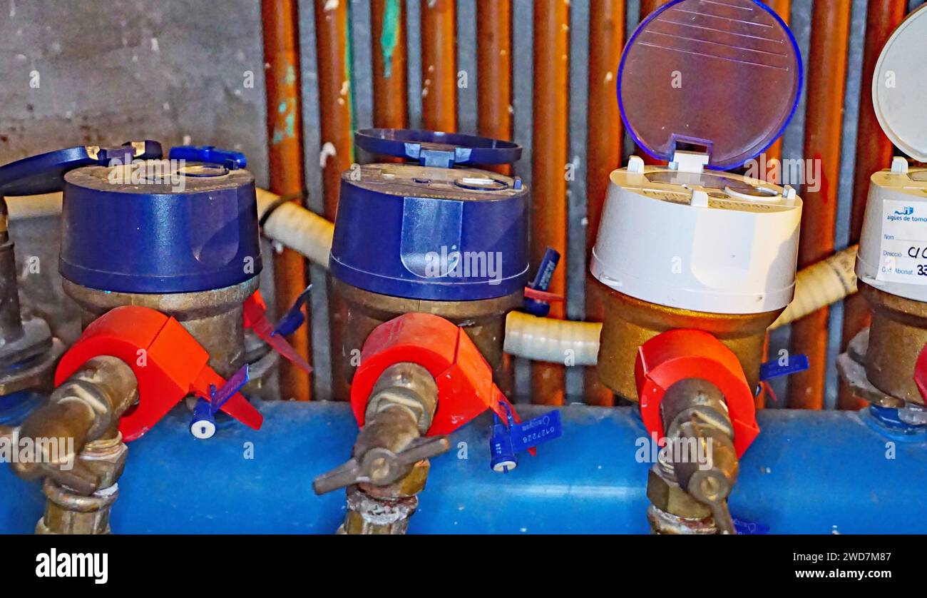 Water meters of a block of flats for backgrounds Stock Photo - Alamy