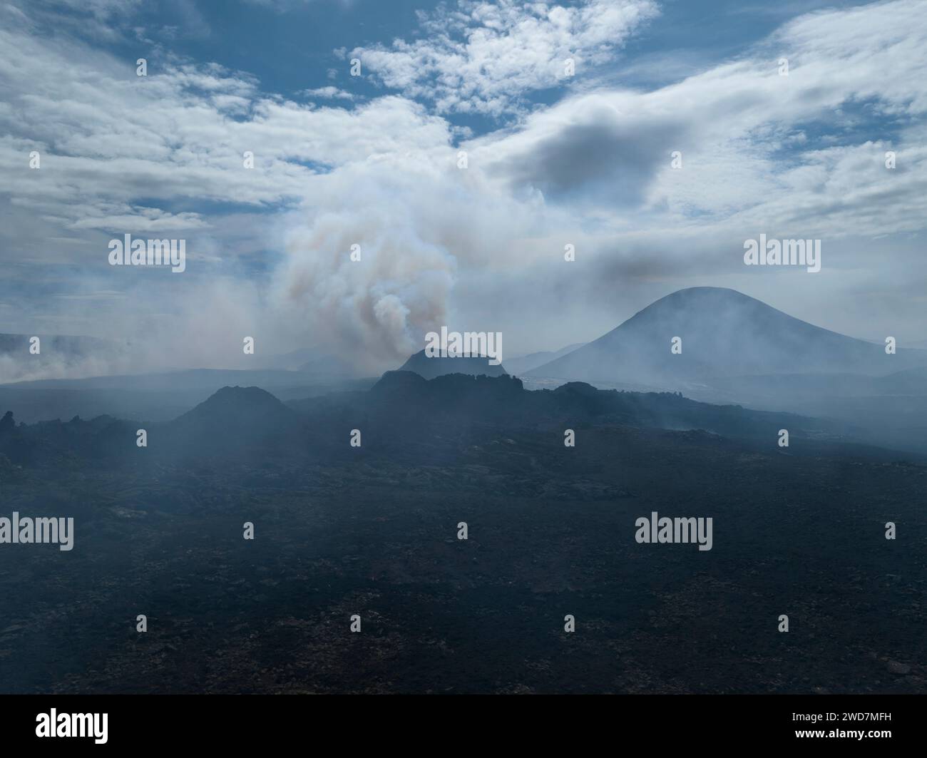 Volcano spewing lava on its first day of eruption Stock Photo - Alamy