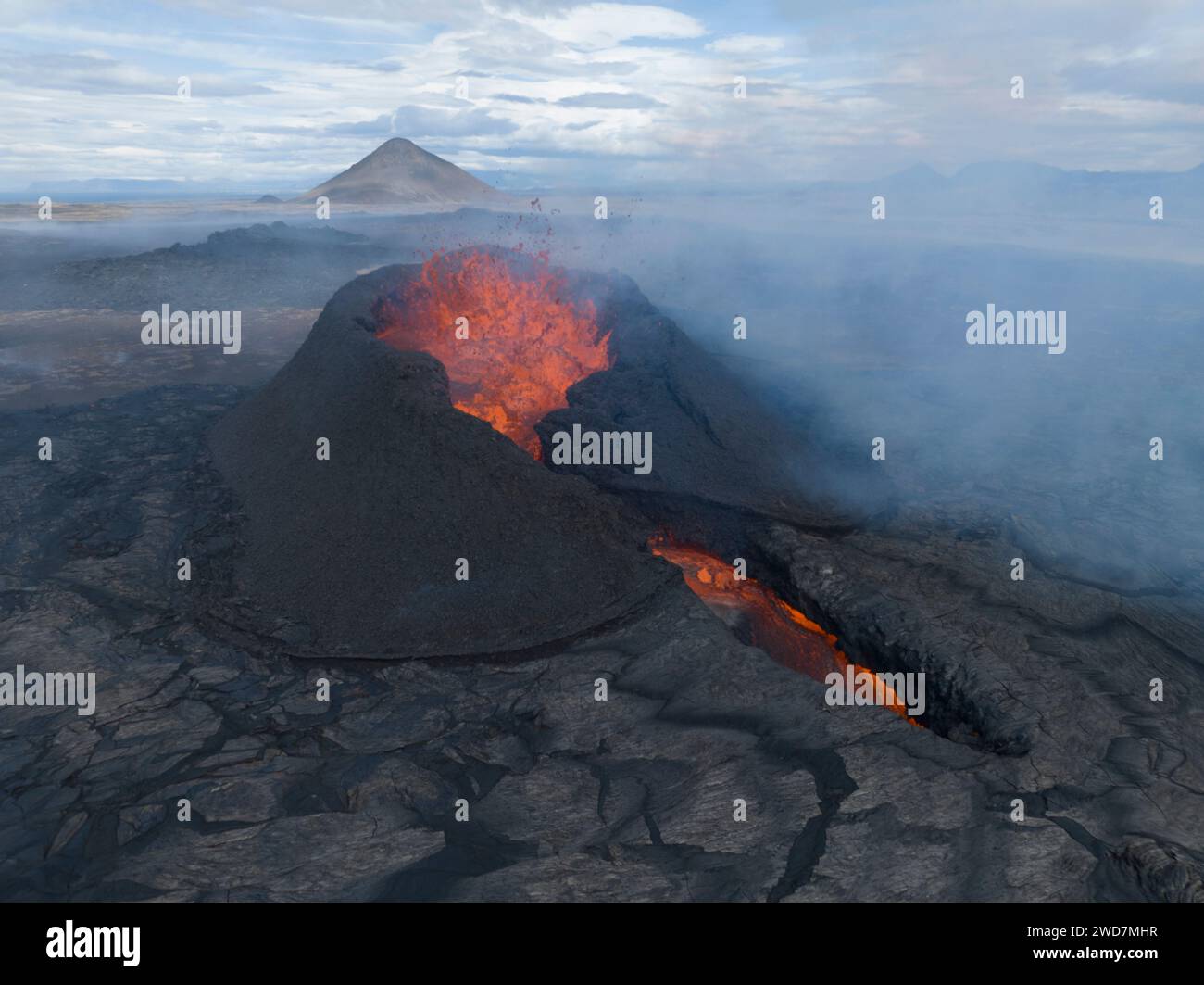 Volcano spewing lava on its first day of eruption Stock Photo - Alamy