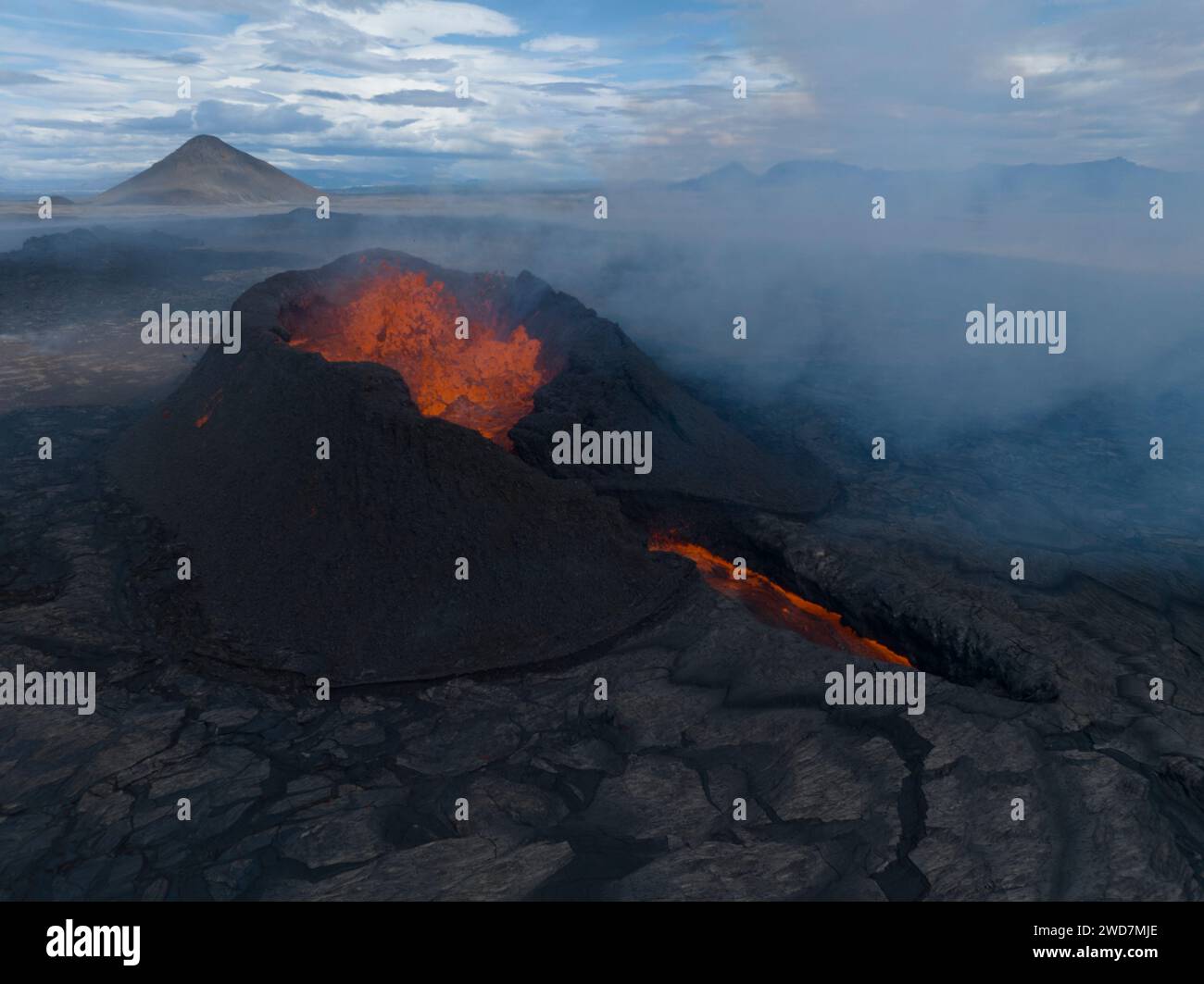 Volcano spewing lava on its first day of eruption Stock Photo - Alamy