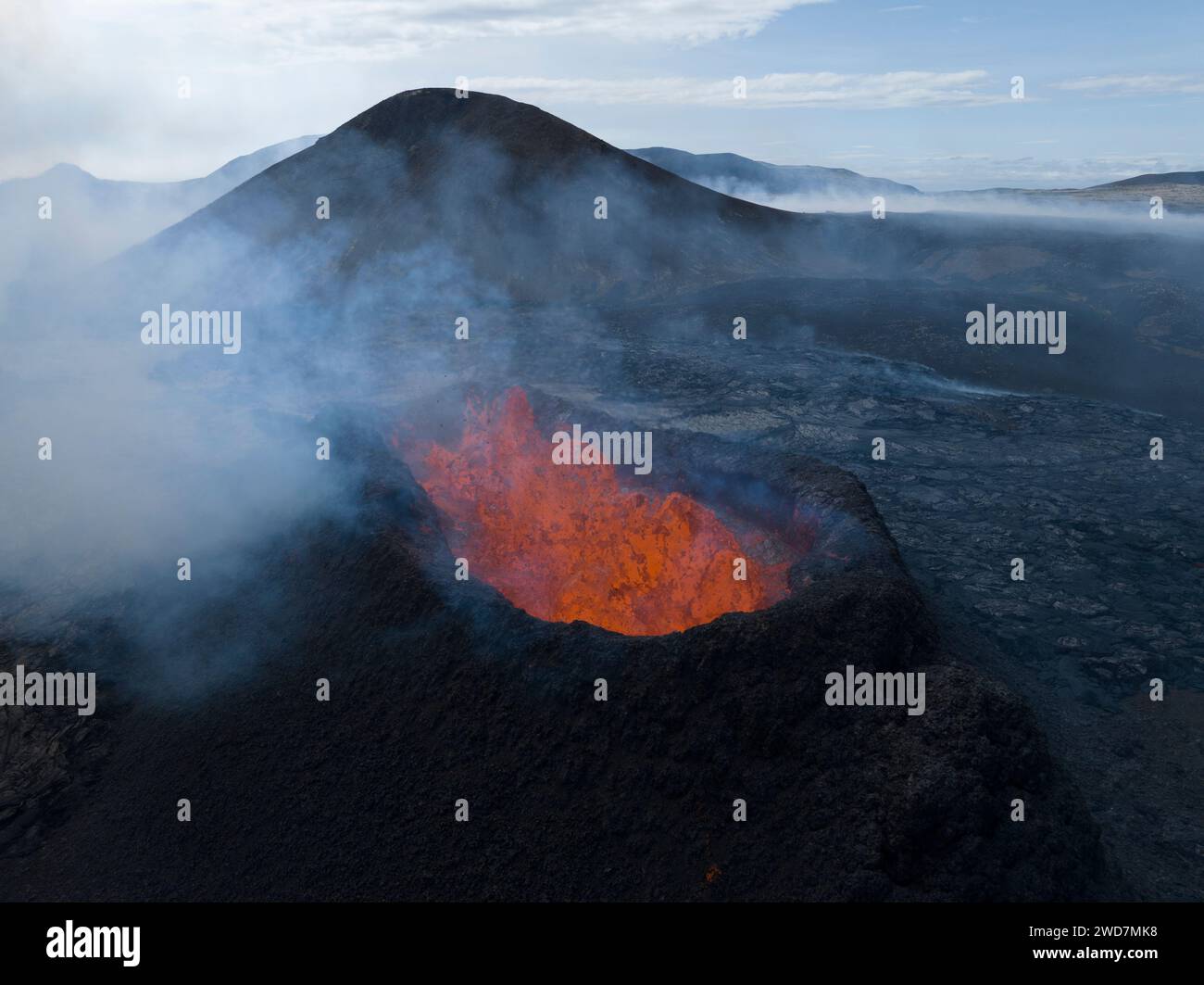 Volcano spewing lava on its first day of eruption Stock Photo - Alamy
