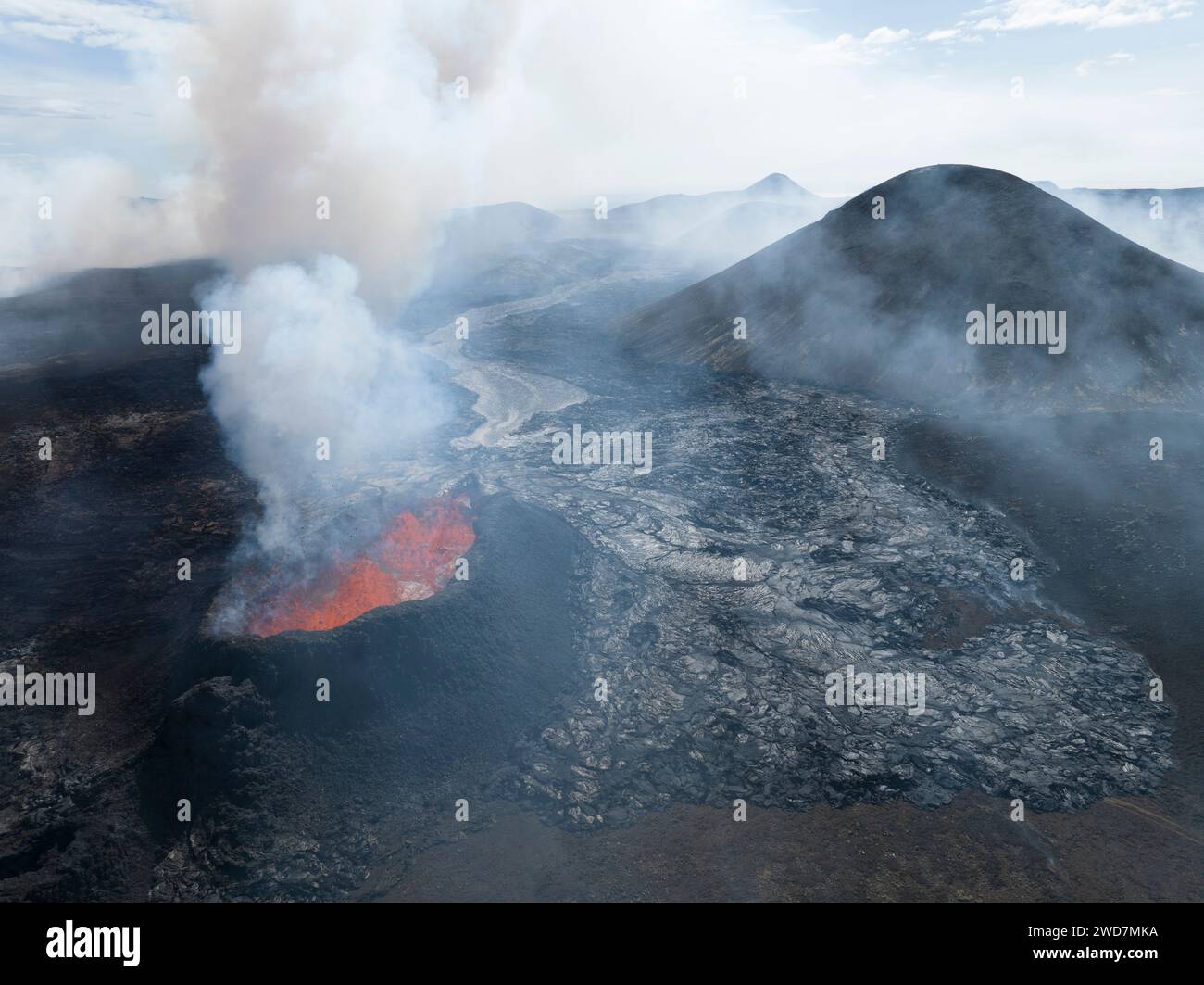 Volcano spewing lava on its first day of eruption Stock Photo - Alamy