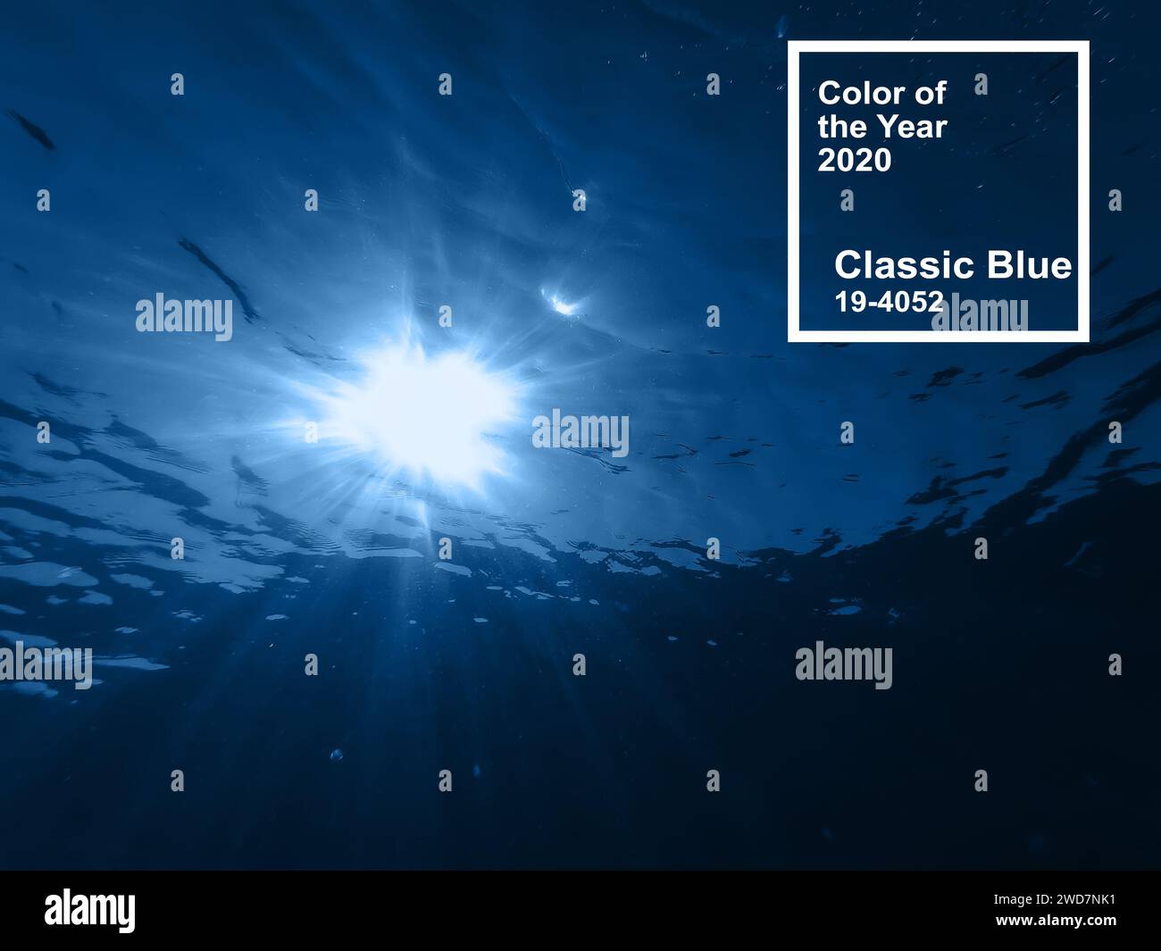 Main color trend 2020 classic blue. depths of the sea with sun rays ...