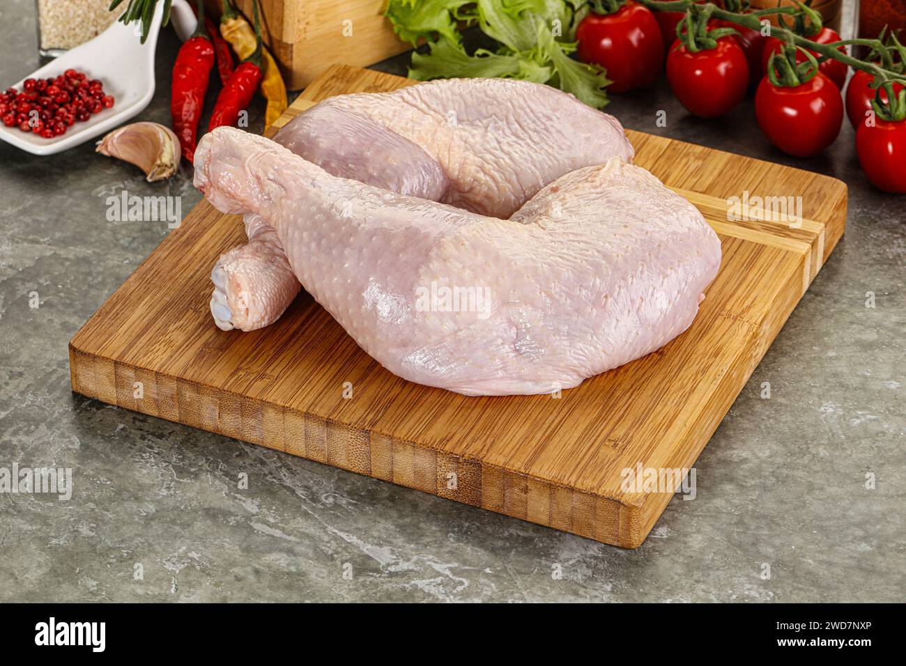 Raw chicken leg foe cooking over board Stock Photo - Alamy