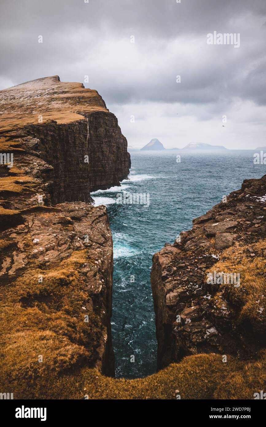 View of dramatic ocean cliffs on island of Vagar, Faroe Islands Stock ...