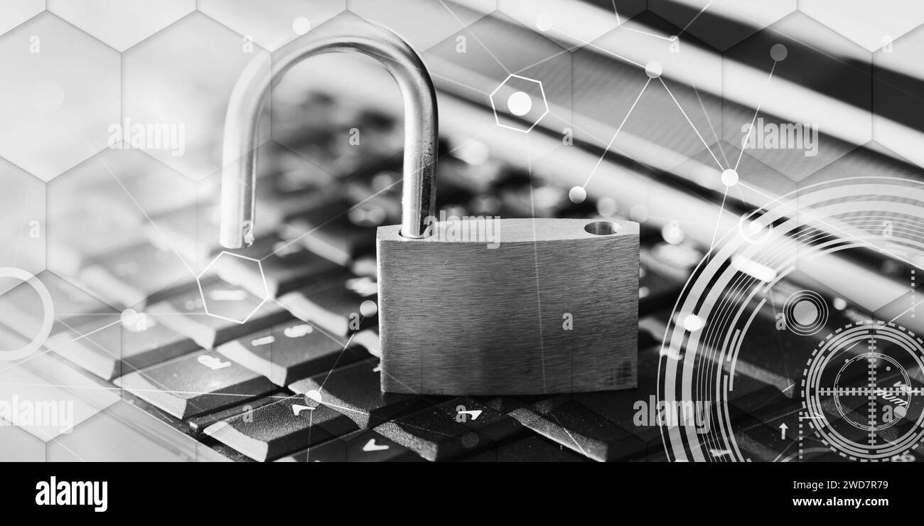 Computer security concept with a padlock on a keyboard, light effect ...