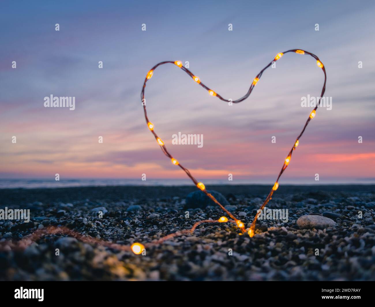 heart symbol with bright fairy lights Stock Photo - Alamy