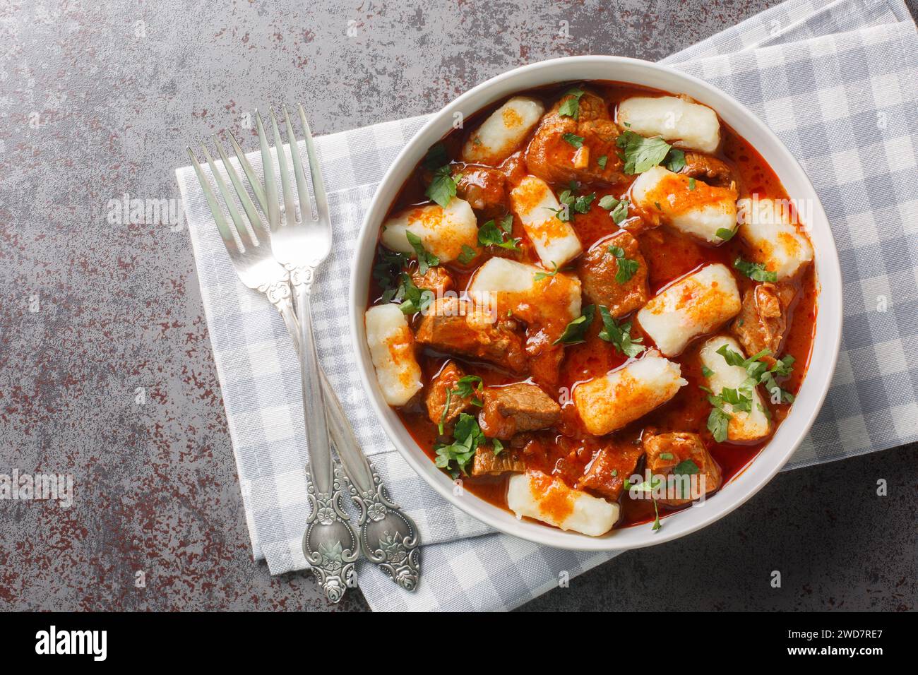 Kopytka Polish dumplings or little hooves made of mashed potatoes ...