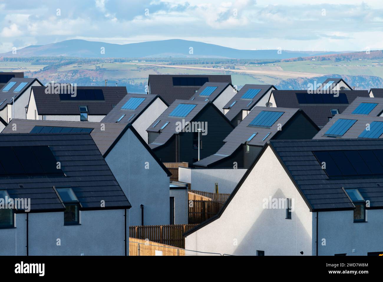 Photograph showing just the roofs of houses with photovoltaic solar ...