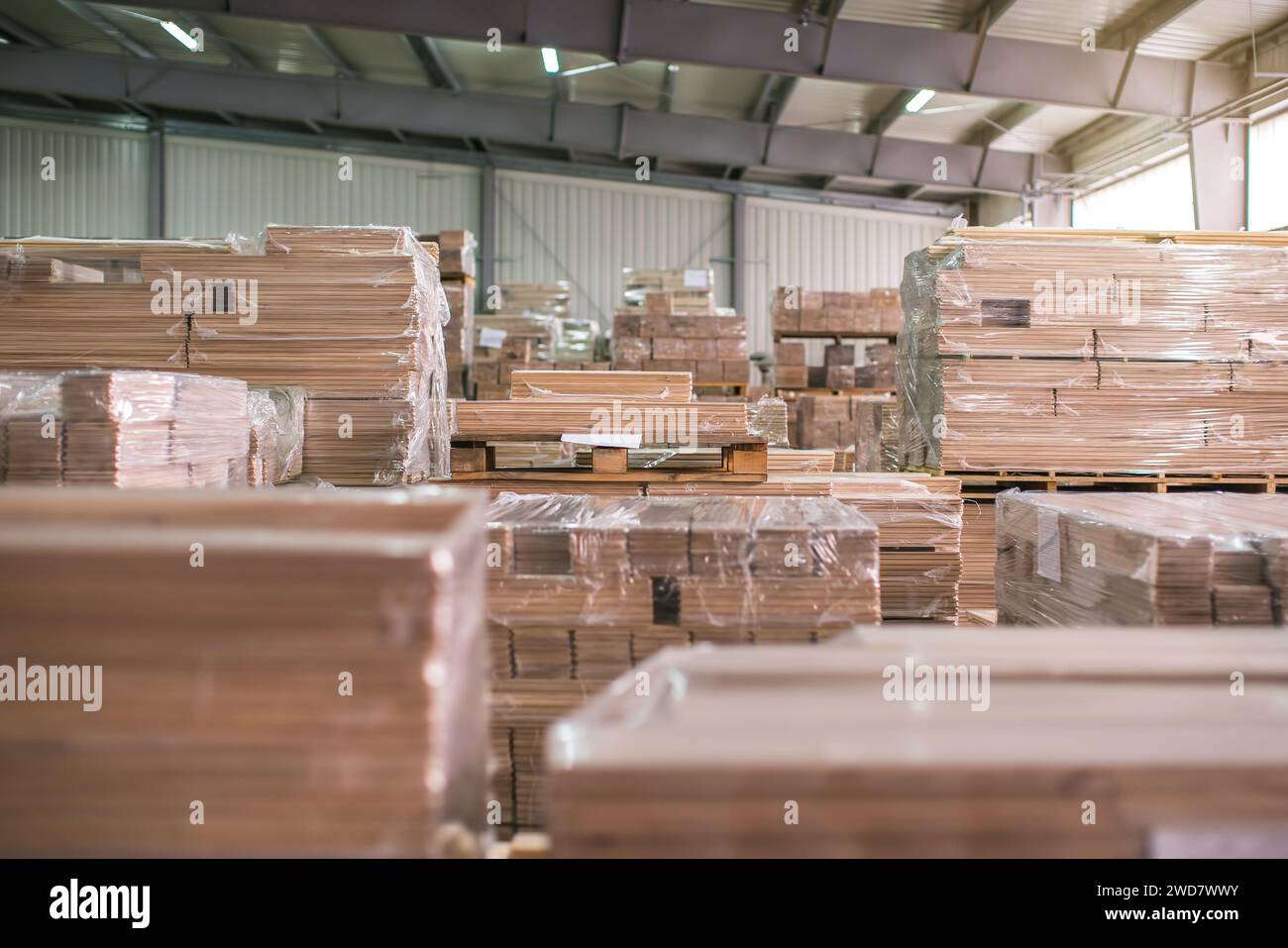 wood processing factory products stored in large warehouse Stock Photo ...