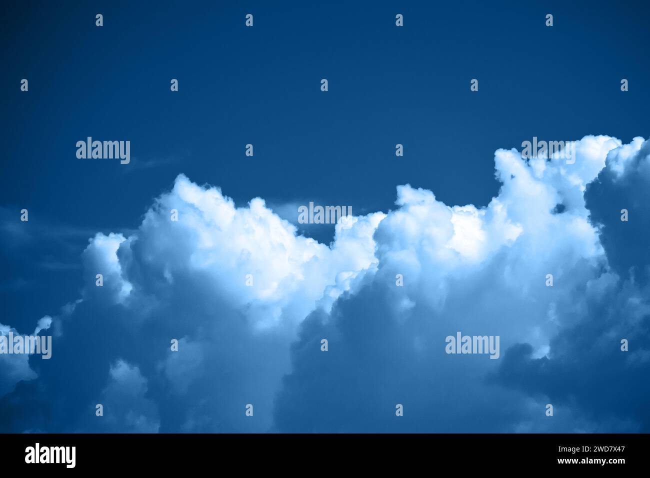 Color of the year 2020 classic blue. Clouds in the sky in the modern ...