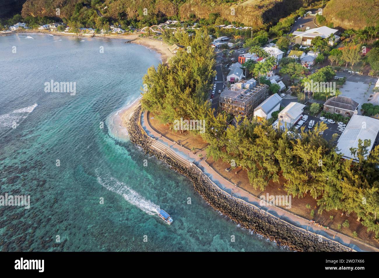 An aerial view of the town of Saint-Leu and its lagoon at sunset on ...