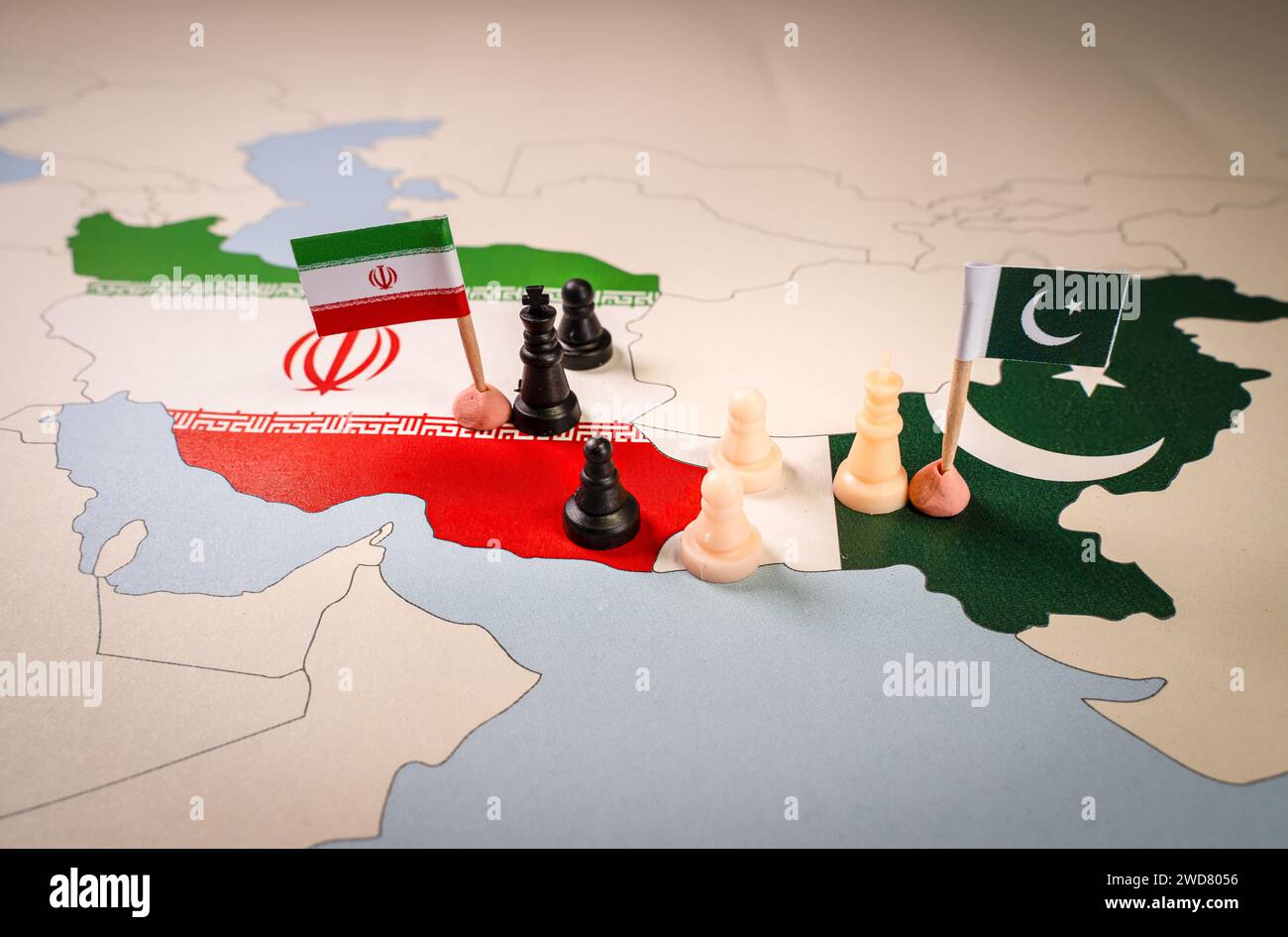 Flags of Iran and Pakistan with chess pieces symbolizing the conflict ...