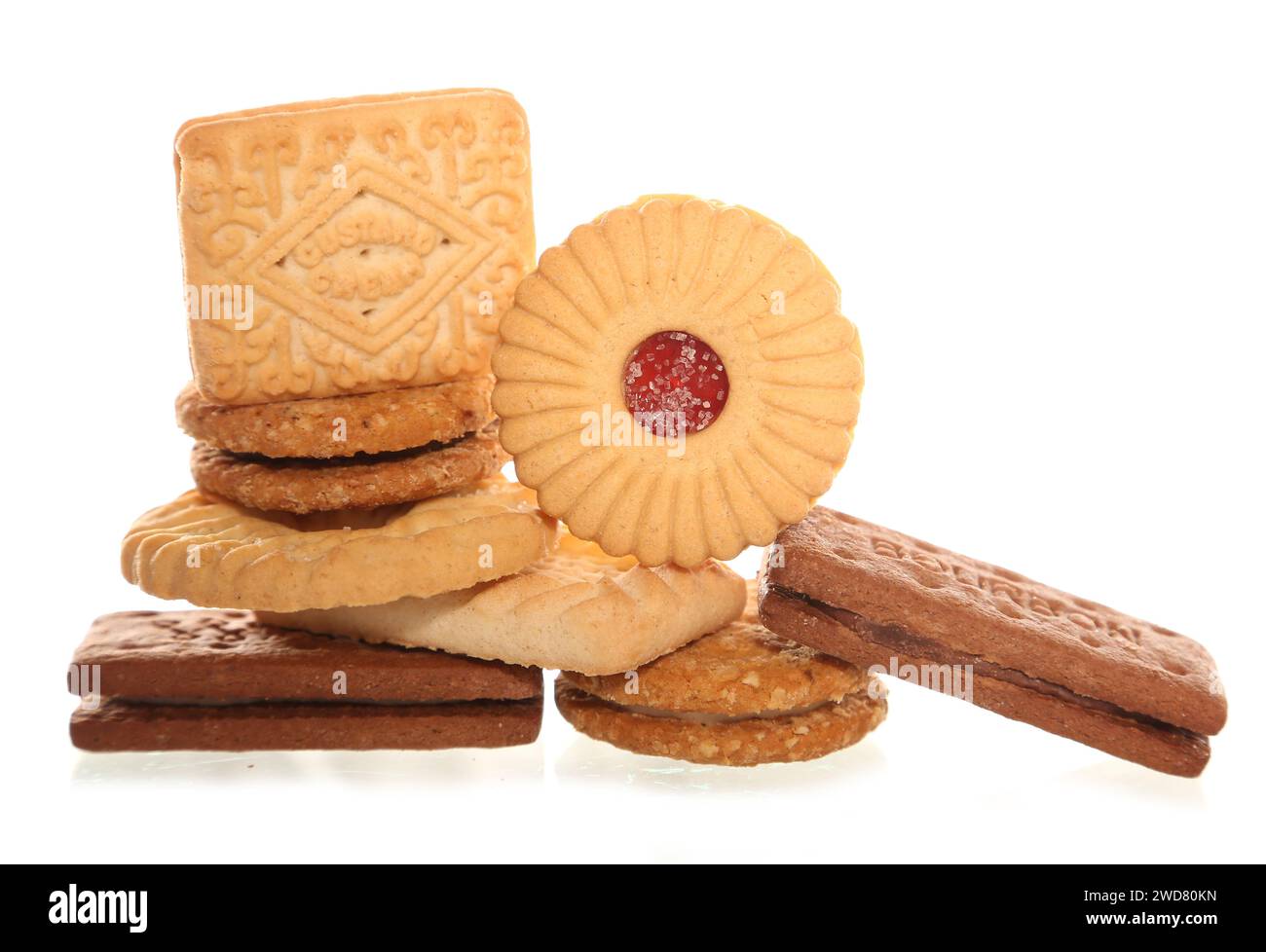 Pile of variety biscuits isolated on a white background Stock Photo - Alamy