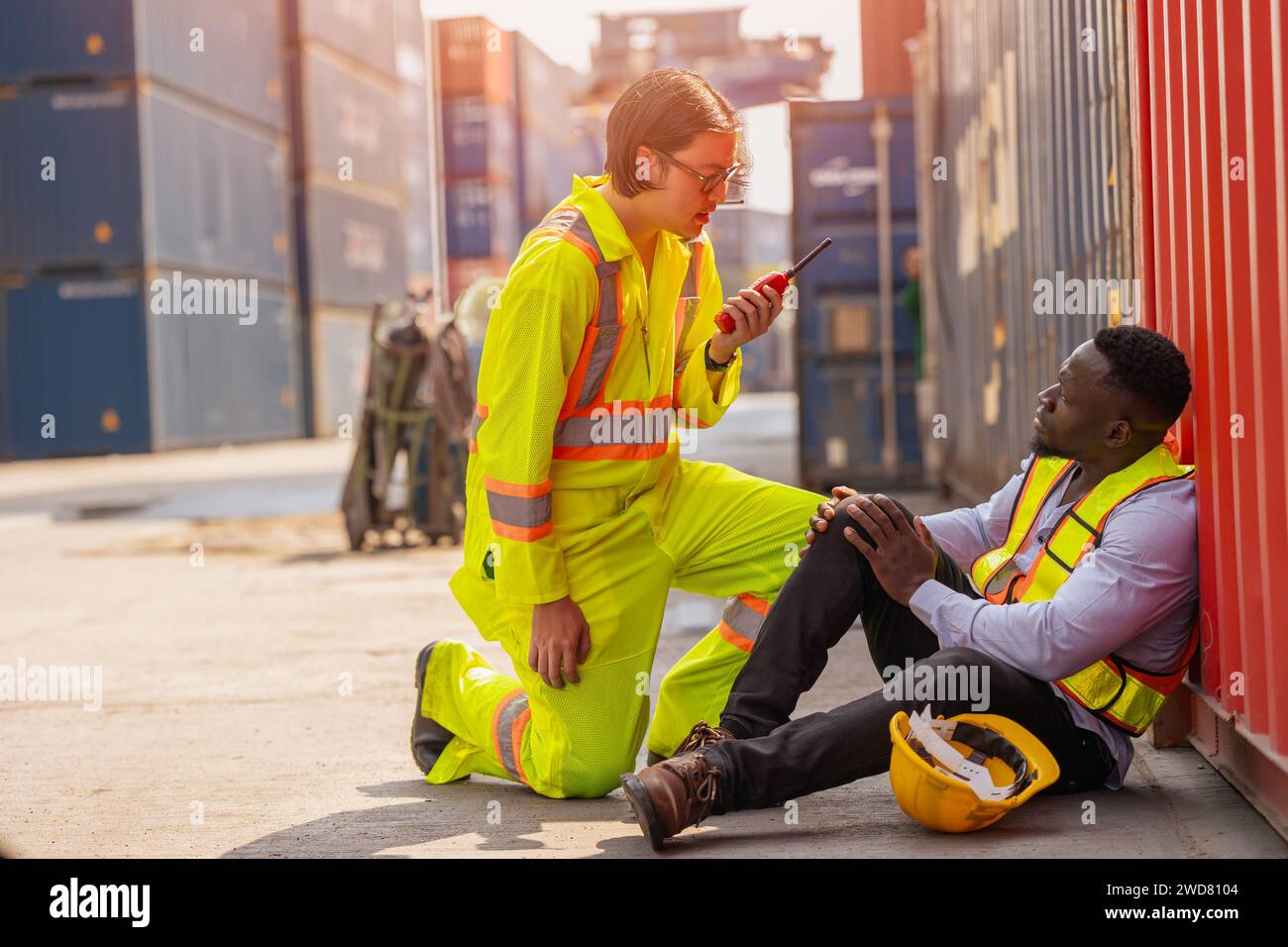 black african worker accident leg injury medic medical team staff help ...