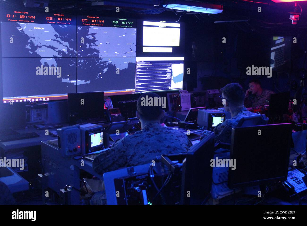 U.S. Marines on watch stander duty monitor screens at the Land Force ...