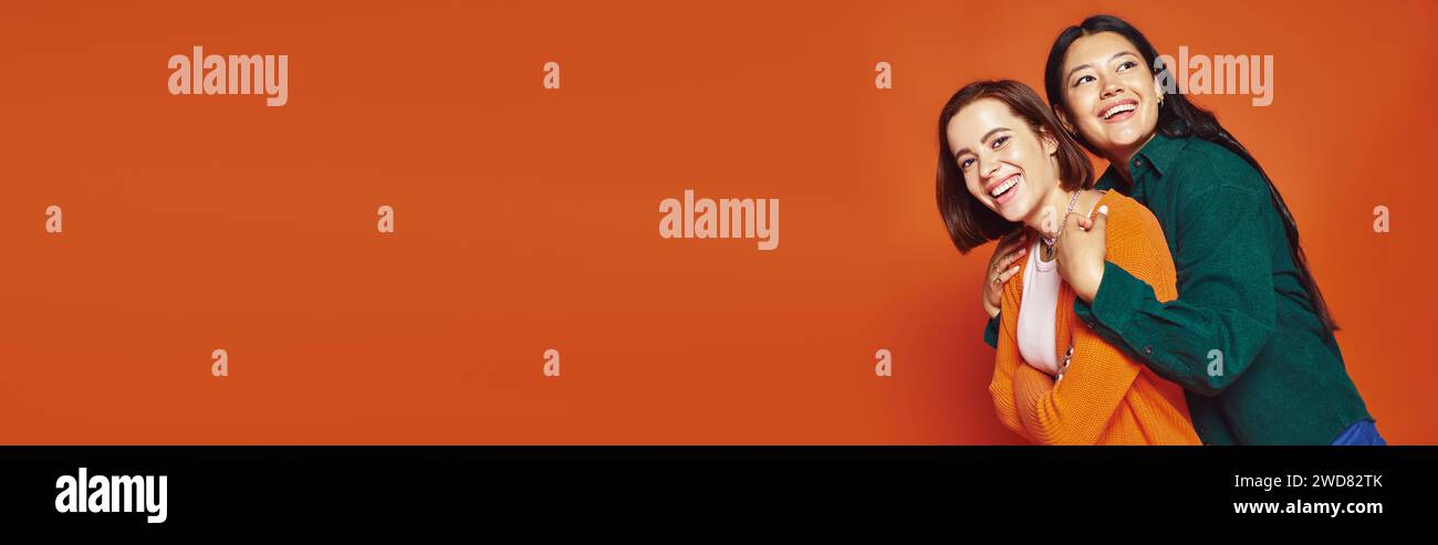 friends in casual clothing hugging and sharing happy moment together on ...