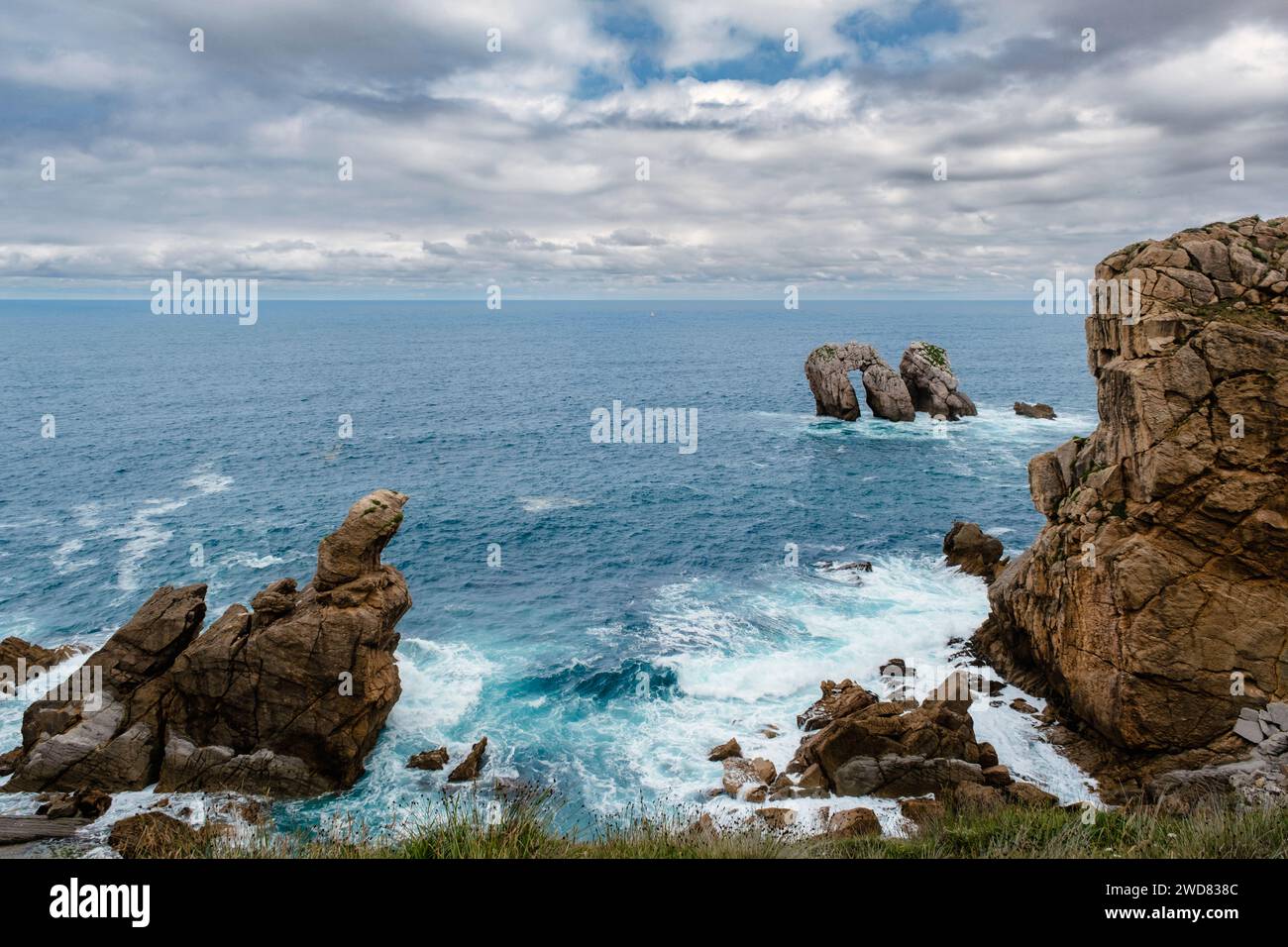 Spectacular coastal landscape with steep cliffs and rock formations ...
