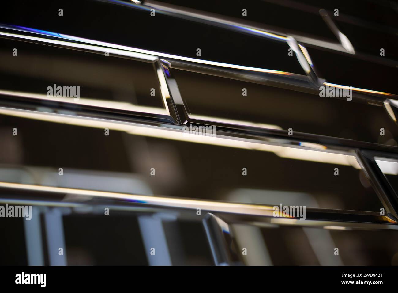 Mirror wall. Mirror tiles. Interior decor element. Reflective surface ...