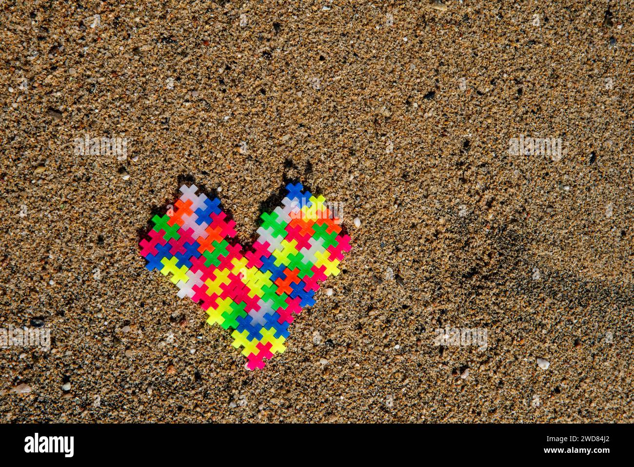 Puzzle heart: Love and connection depicted by colorful puzzle pieces on ...