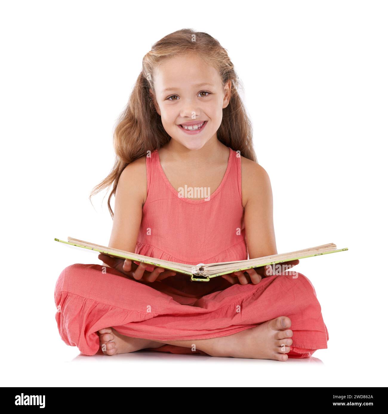 Portrait, happy and child reading books in studio for learning ...