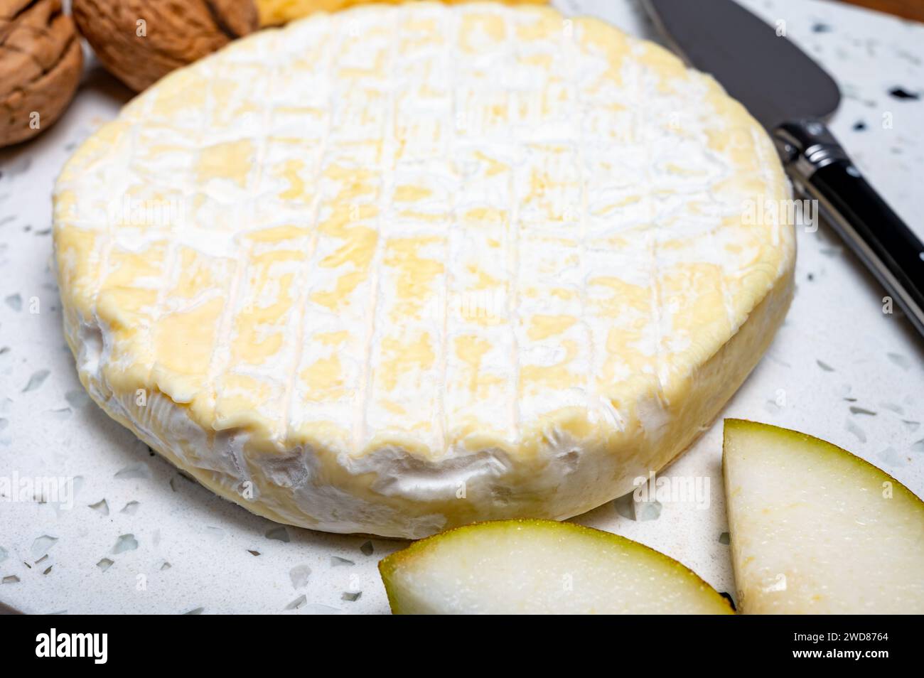 French soft Cremeux de Normandie cheese, soft creamy cheese with white ...