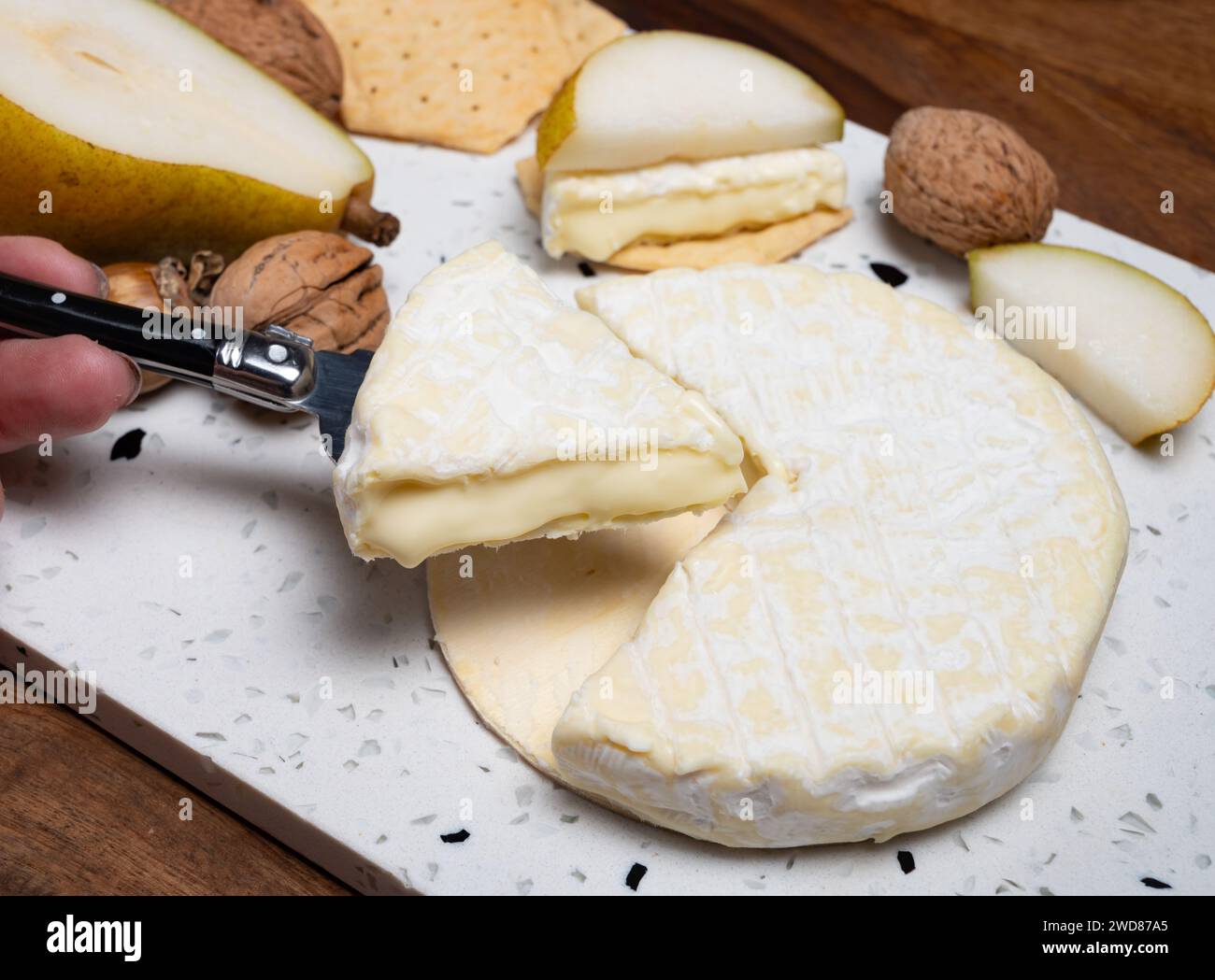 French soft Cremeux de Normandie cheese, soft creamy cheese with white ...