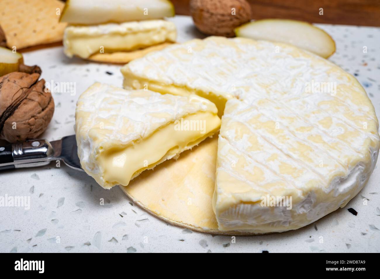 French soft Cremeux de Normandie cheese, soft creamy cheese with white ...