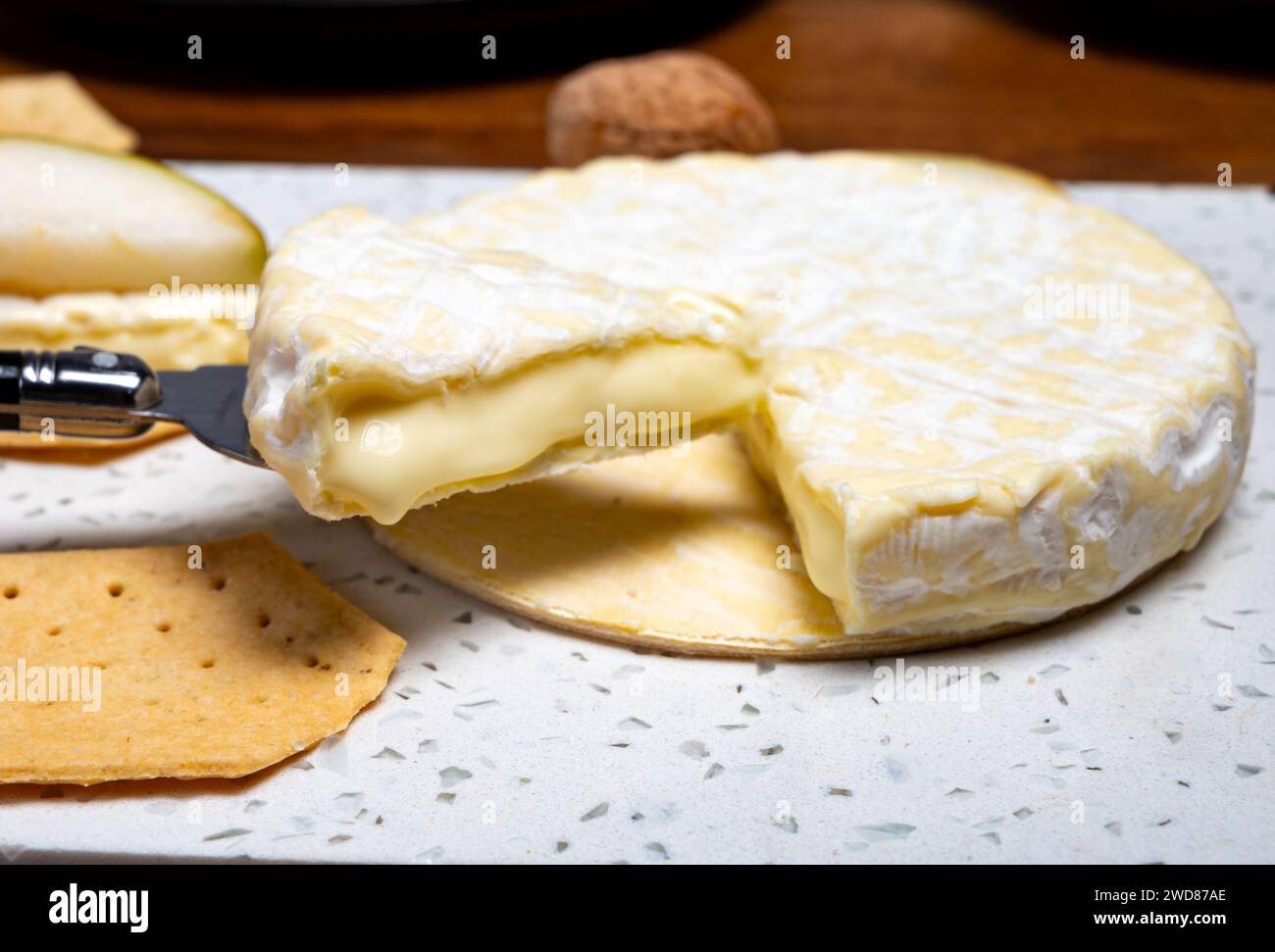 French soft Cremeux de Normandie cheese, soft creamy cheese with white ...