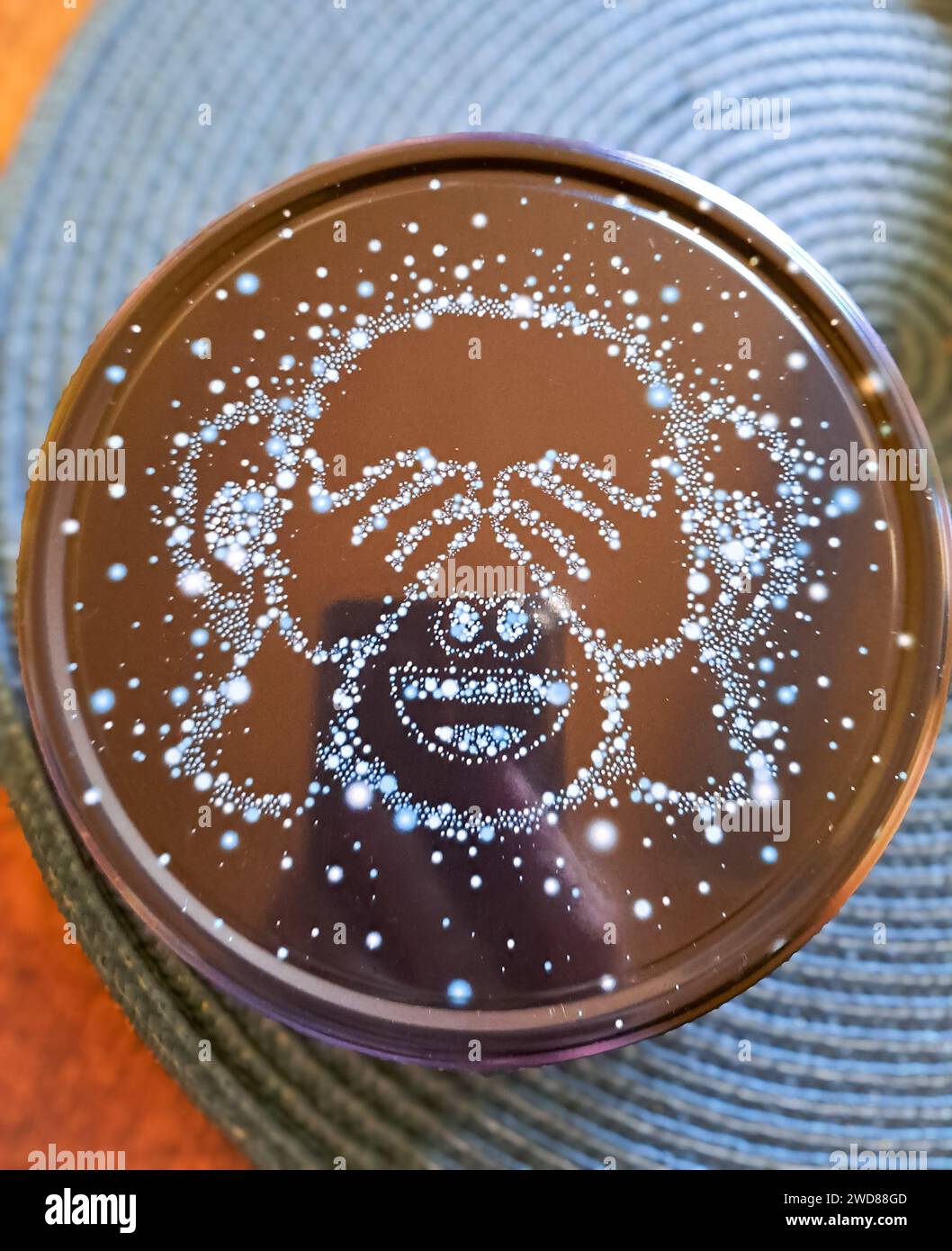 An image of a small star monkey with its eyes closed. I can't see ...