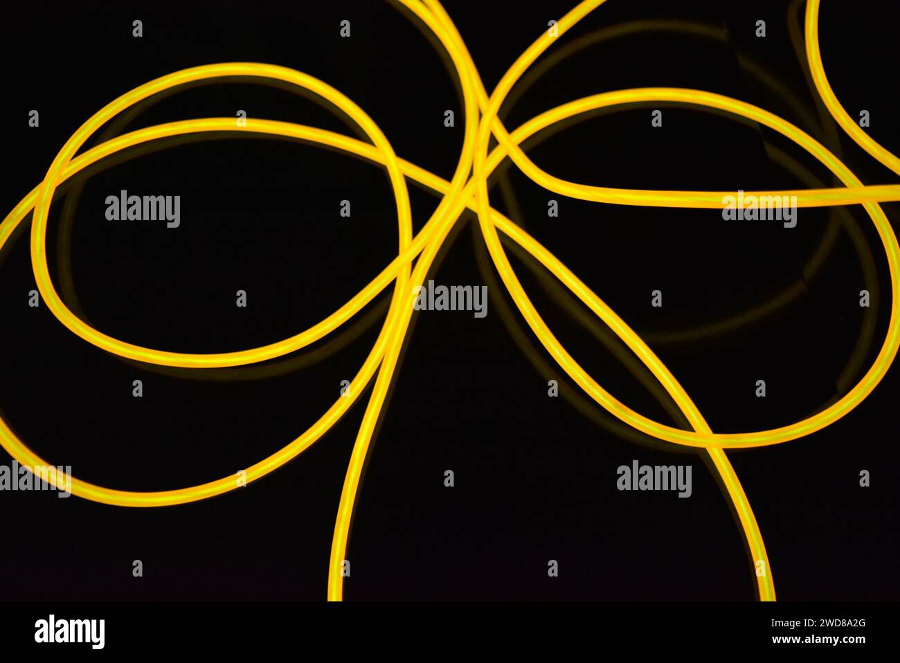Original yellow lighting of thick electoluminescent wires and lines ...