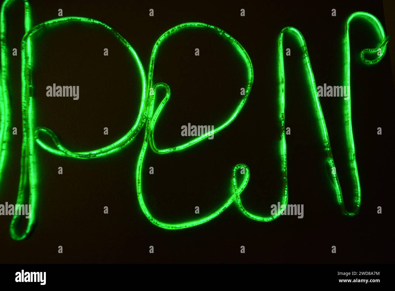 Lime green lighting with specific pattern with inscription, letters ...