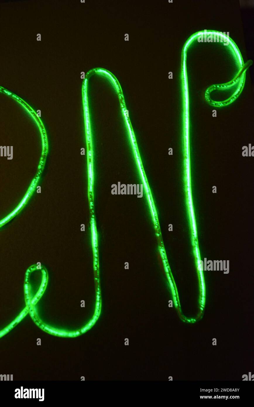 Lime green lighting with specific pattern with inscription, letters ...