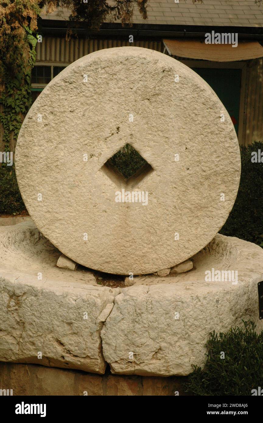 A well preserved, ancient, stone olive press used for the extraction of ...