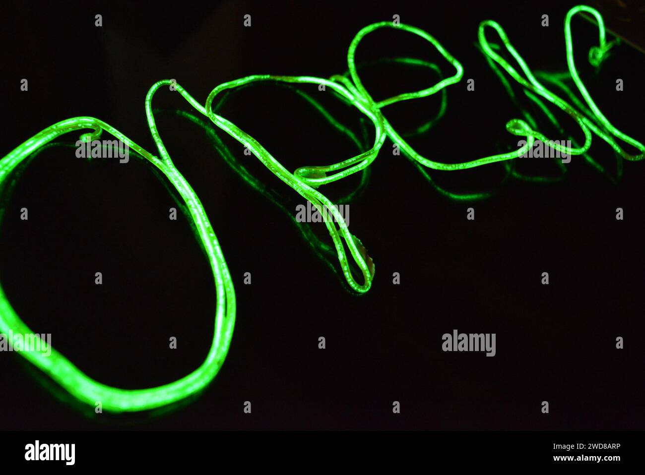 Lime green lighting with specific pattern with inscription, letters ...