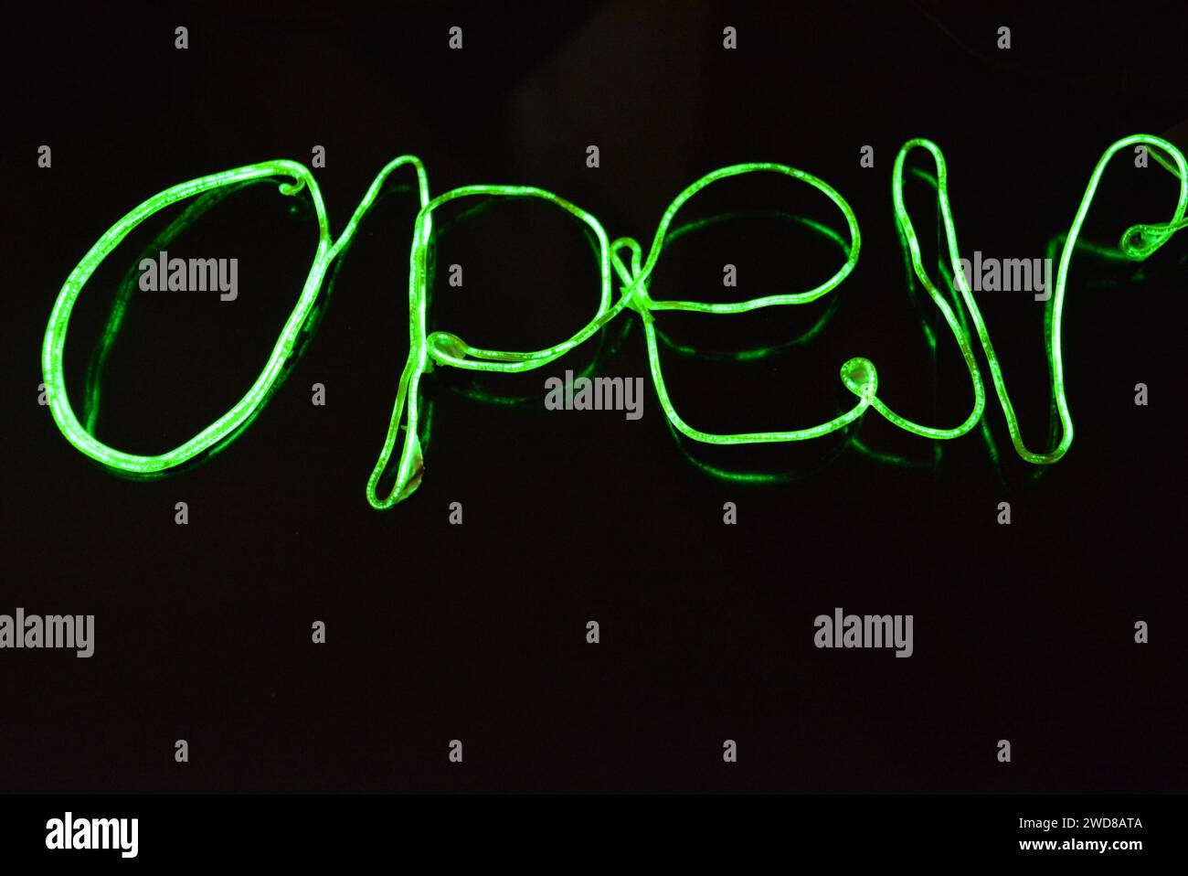 Lime green lighting with specific pattern with inscription, letters ...