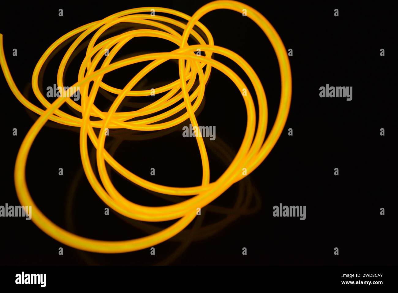 The original yellow lighting of thick electoluminescent wires and lines ...