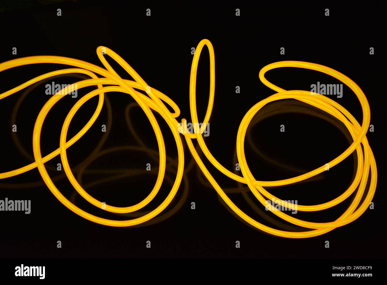 The original yellow lighting of thick electoluminescent wires and lines ...