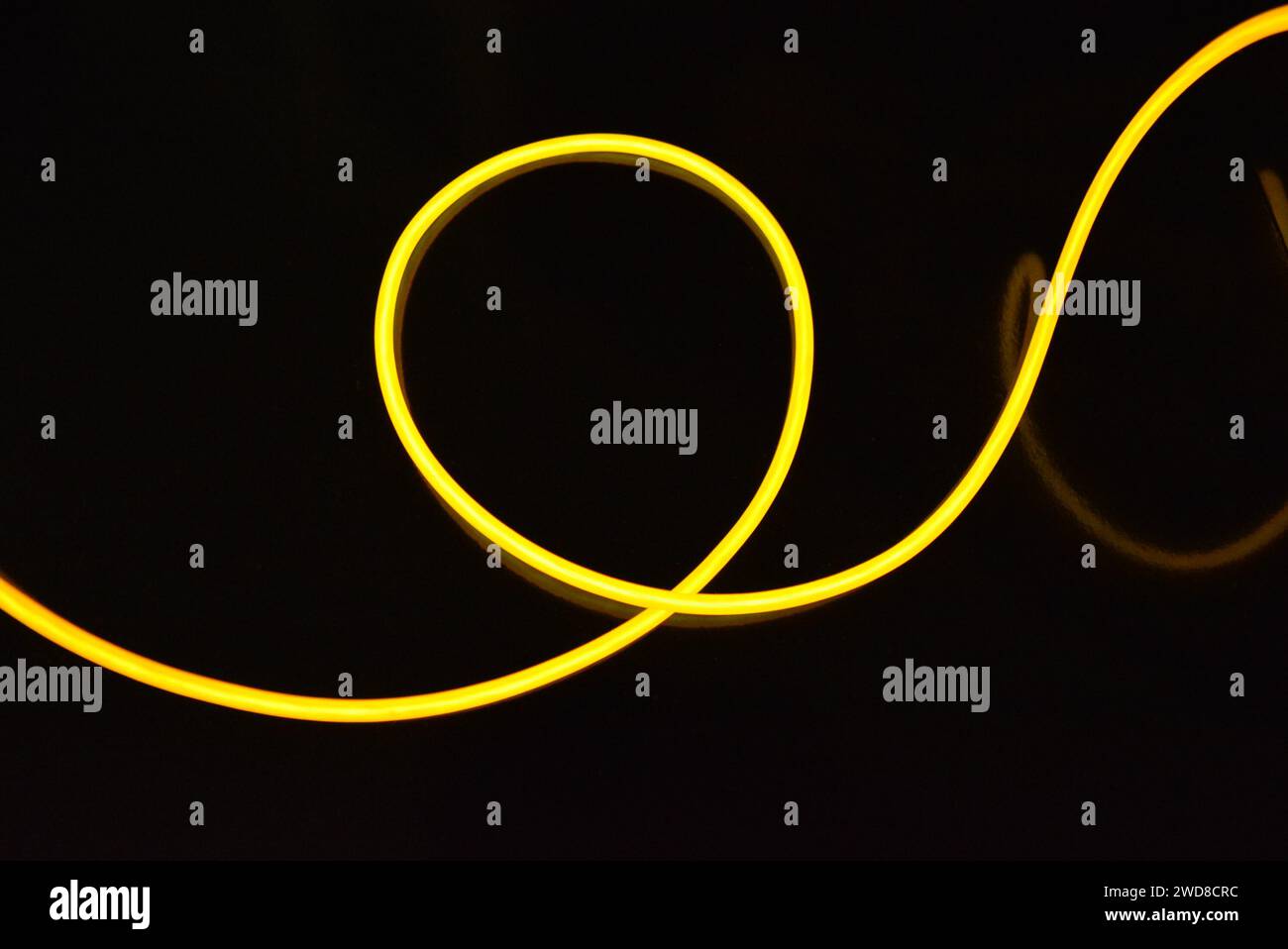 The original yellow lighting of thick electoluminescent wires and lines ...