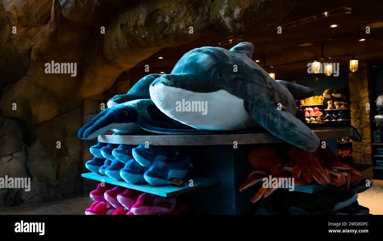 Soft toys on the shelf, souvenirs close up Stock Photo - Alamy