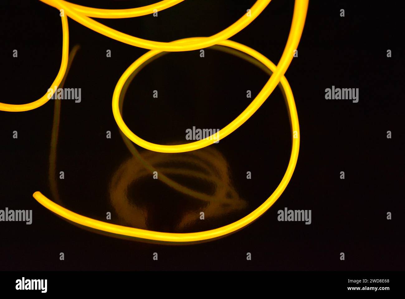 The original yellow lighting of thick electoluminescent wires and lines ...