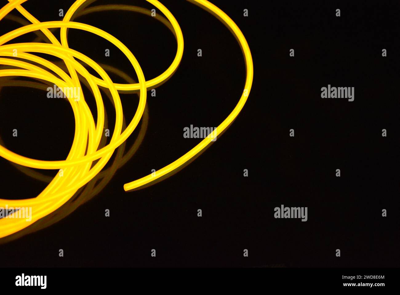 The original yellow lighting of thick electoluminescent wires and lines ...